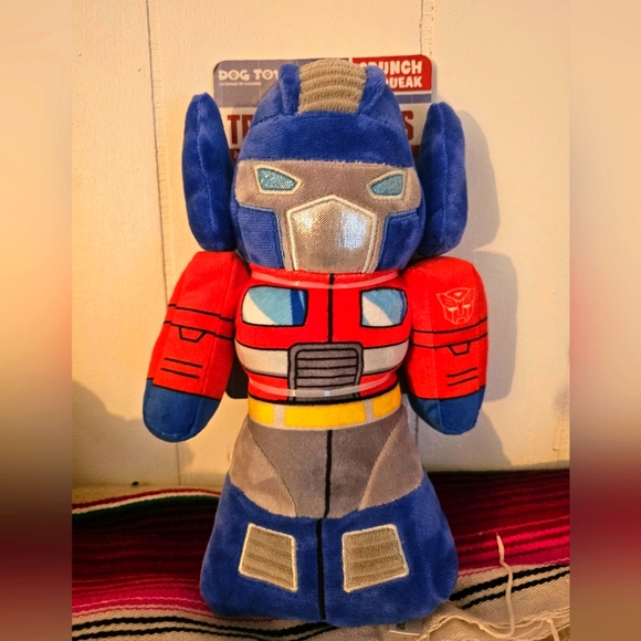 Hasbro | Dog | Hasbro Transformers Optimus Prime Crunch Squeak Dog Toy ...